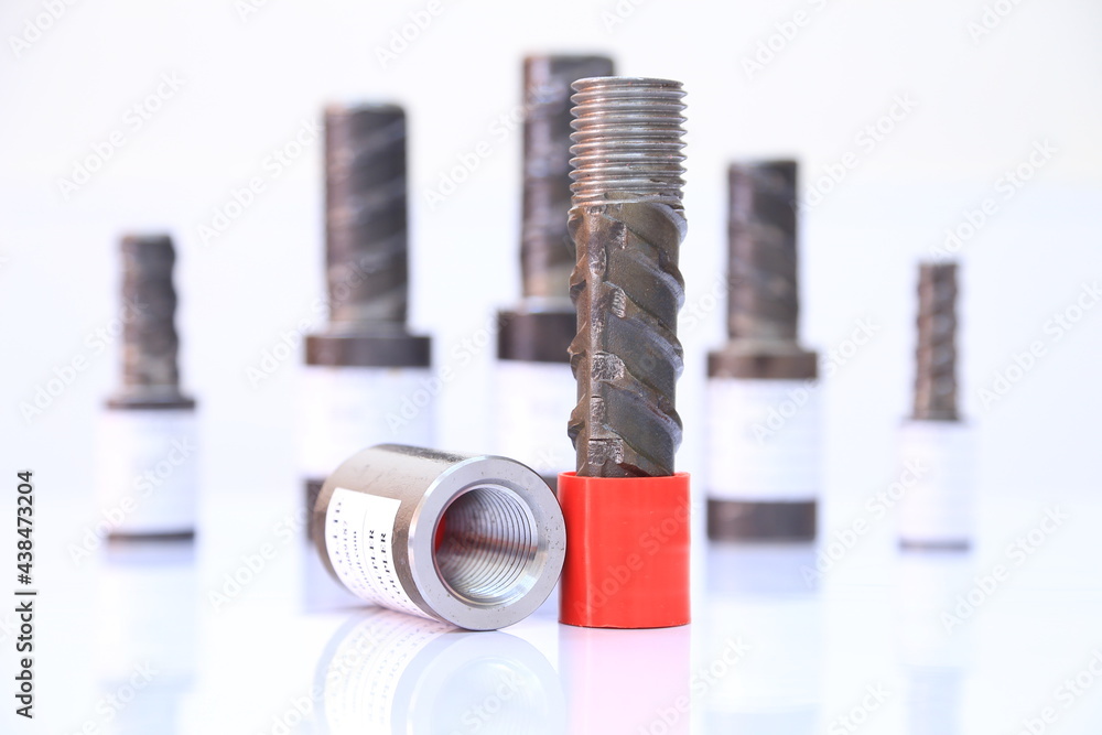 Tapping threads on deformed steel for use in reinforced concrete ...