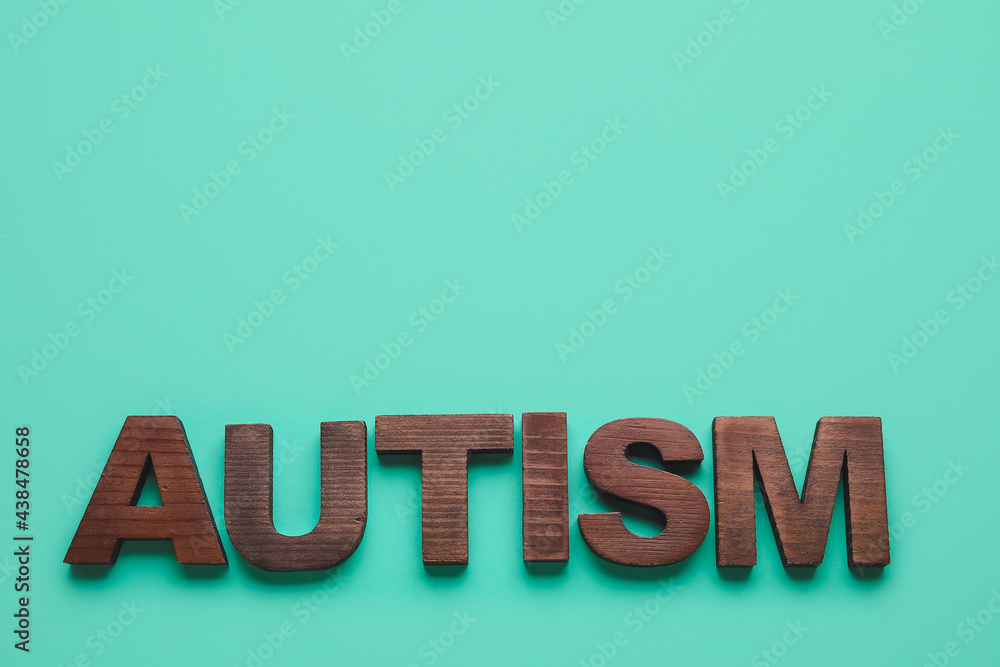 Word AUTISM on color background Stock Photo | Adobe Stock