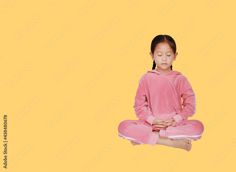 Cute little asian child girl in pink tracksuit with eyes closed ...