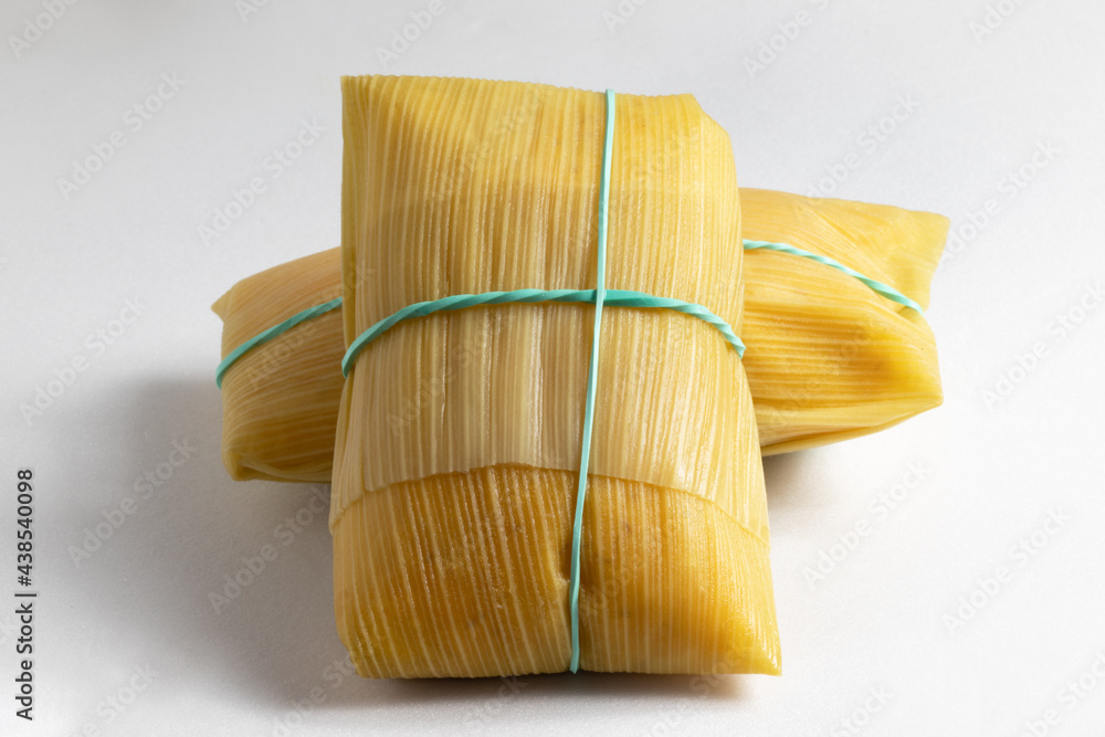Typical Brazilian corn snack pamonha isolated on white background ...