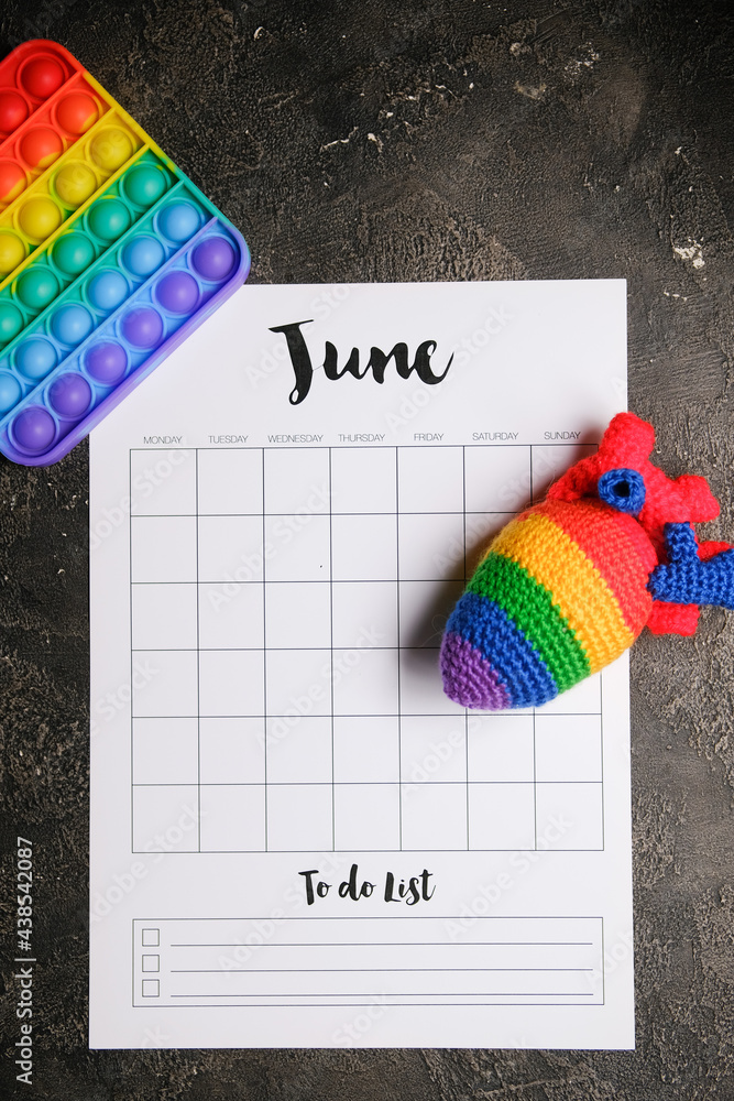 Pride month calendar with LGBT flag cookies. A place for text. Deadline ...