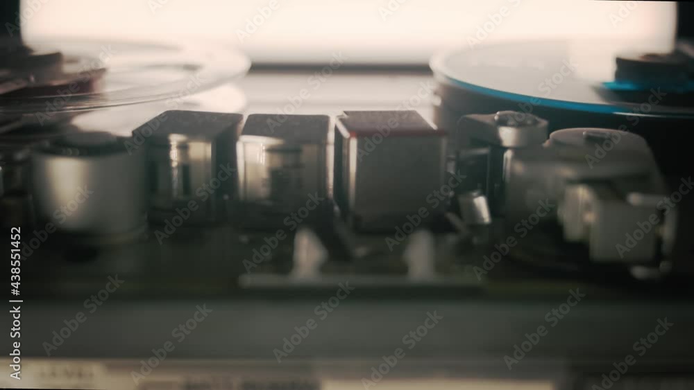 The tape on the professional recording device is at the end and is ...