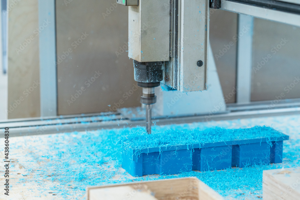 CNC drill machine cutting mold from plastic, close up. Stock Photo ...
