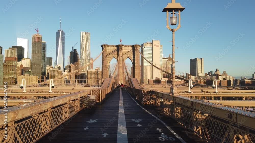 Brooklyn Bridge Promenade at sunrise with Manhattan skyline in the ...