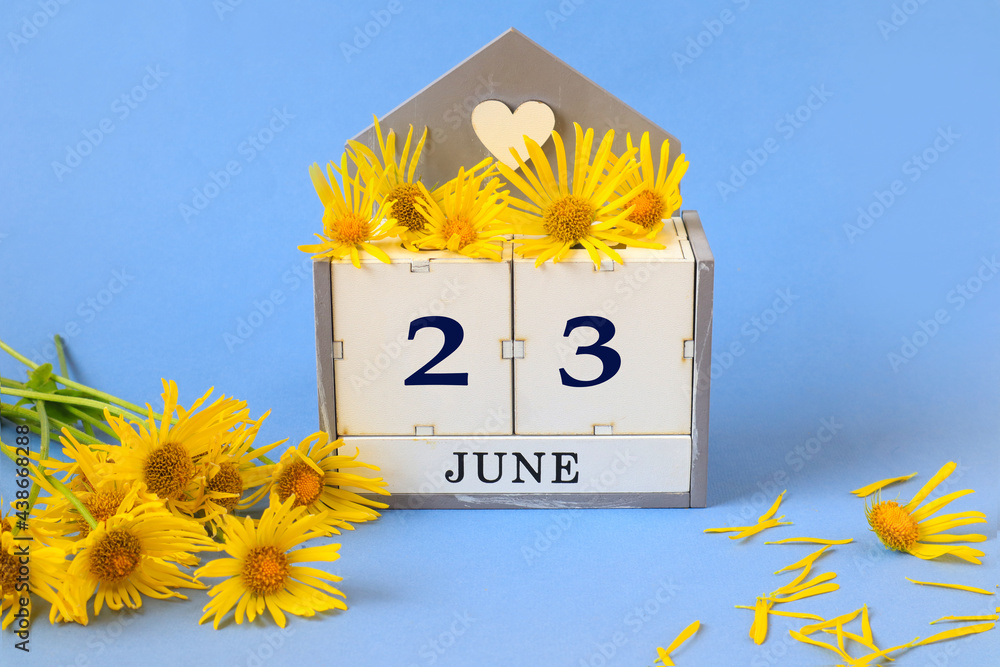 Calendar for June 23: cubes with the number 23 , the name of the month ...