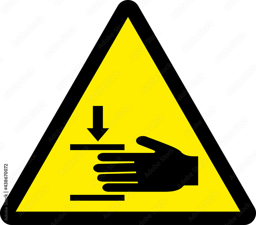 Crushing hazard warning sign. Black on yellow triangle background ...