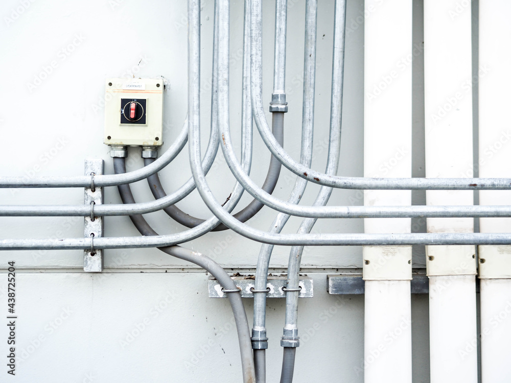 Conduit in power plant Stock Photo | Adobe Stock