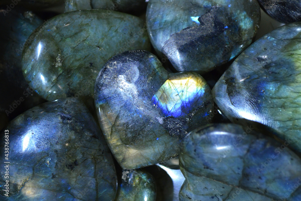 Labrador polished stone. Pearl overflows of the rainbow spectrum of the ...