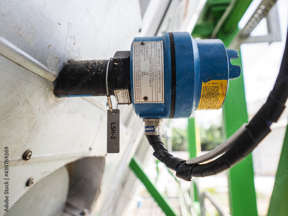 Level switch of silo in biomass power plant. Stock Photo | Adobe Stock