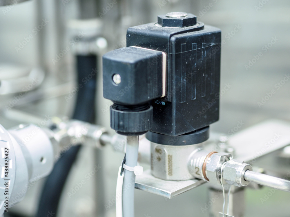 Solenoid valve of water pipe line in sampling analyzer room at power ...
