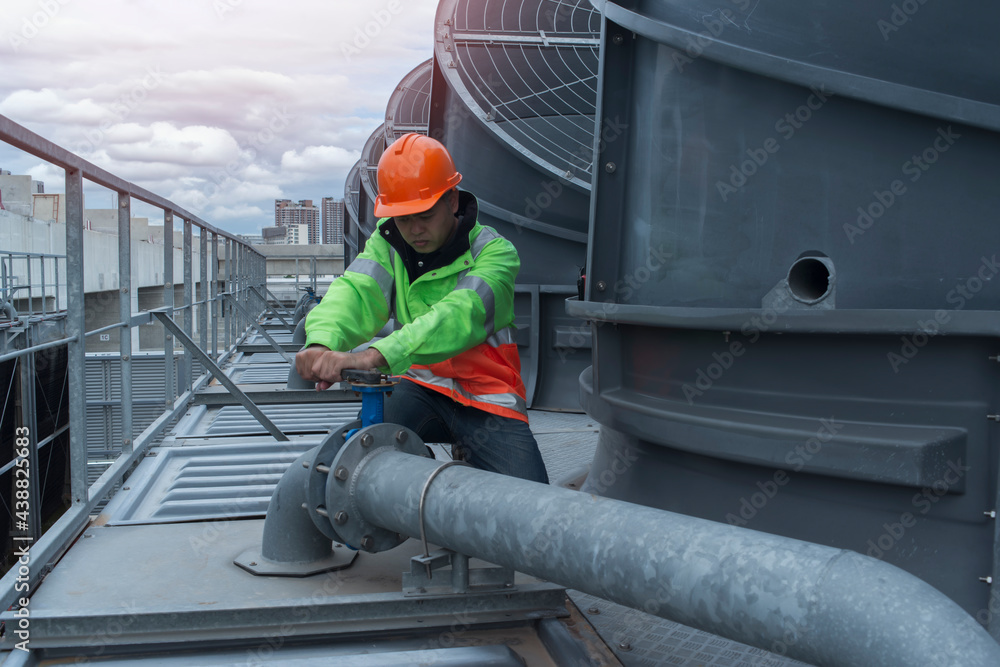 worker at work. Contractor inspection installation equipment on site ...