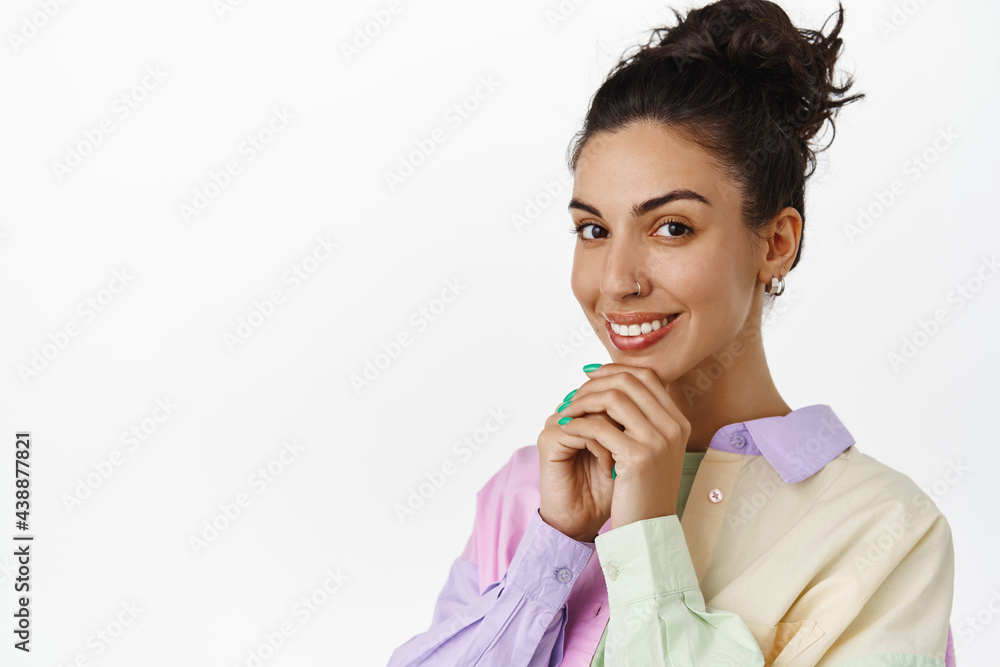 Tender and beautiful woman gazing at camera with happy, cute face ...