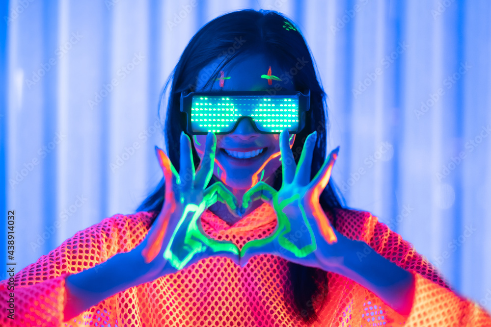 Neon asian woman dancing. Fashion model woman in neon light, portrait ...