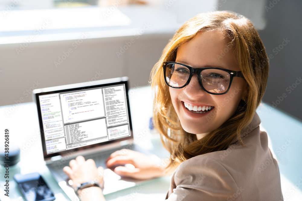 Programmer Woman Coding On Computer Stock Photo | Adobe Stock