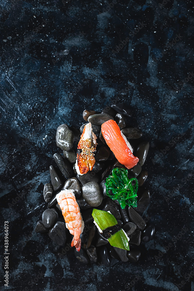 Traditional Japanese Dish - Nigiri Sushi. Rolls with salmon, eel, tuna ...