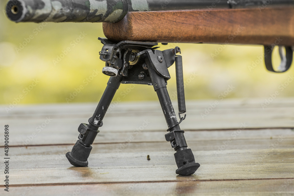 Wooden sniper rifle with scope and bipod Stock Photo | Adobe Stock