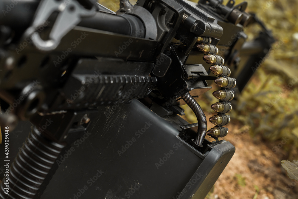 M249 light machine gun with 7.62 mm cartridge belt black and white ...