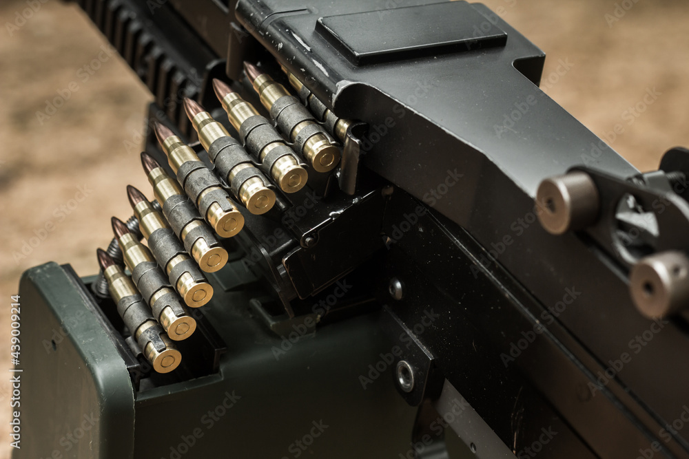 M249 light machine gun with 7.62 mm cartridge belt black and white ...