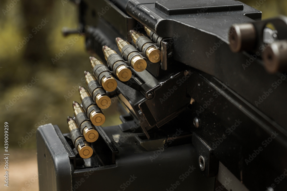 M249 light machine gun with 7.62 mm cartridge belt black and white ...