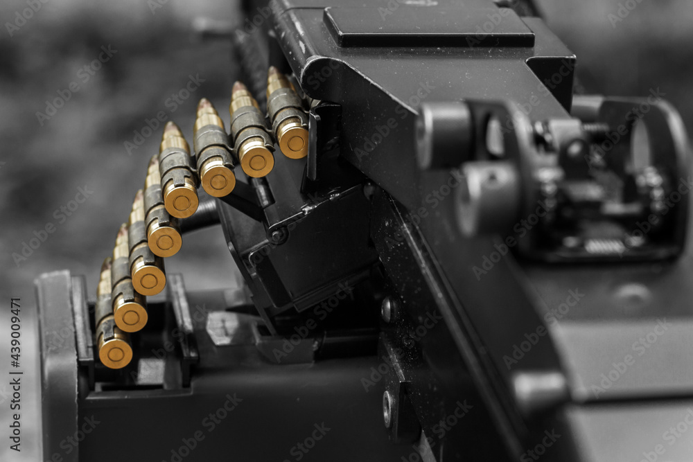 M249 light machine gun with 7.62 mm cartridge belt black and white ...