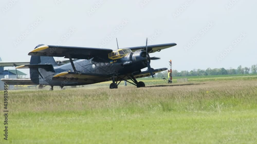 A small propeller plane is moving towards the runway for takeoff. A ... A small propeller plane is moving towards the runway for takeoff. A ...