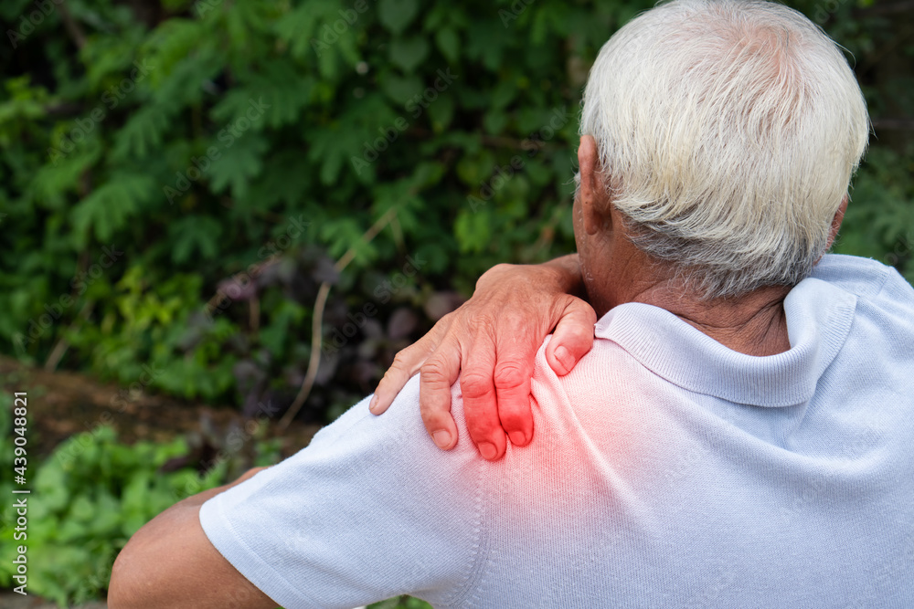 healthcare concept. Asian Older man suffering from shoulder pain ...