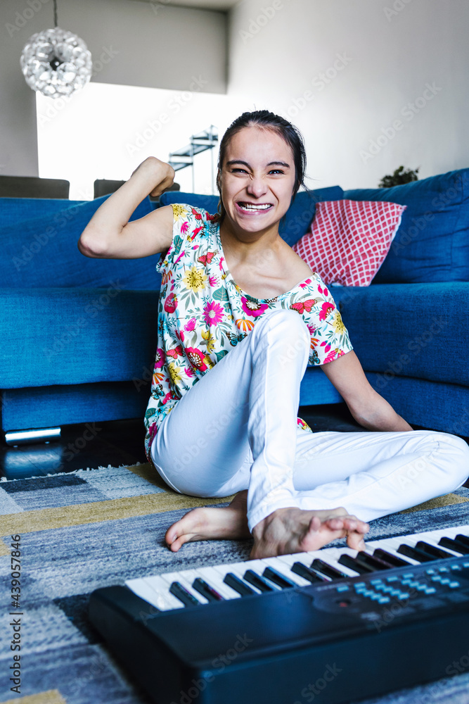 mexican disabled girl with cerebral palsy learning to play the piano ...