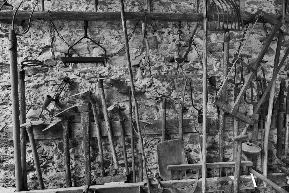 Old household and farm equipment, door keys, pitchforks, rakes, hoes ...