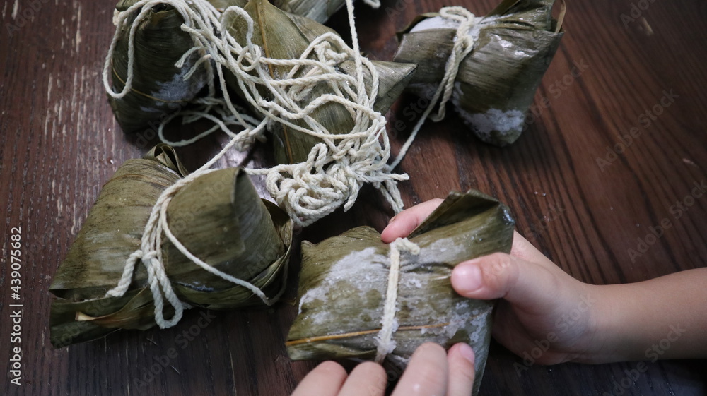 holding Zongzi in hand design for miss concept Zongzi is the ...
