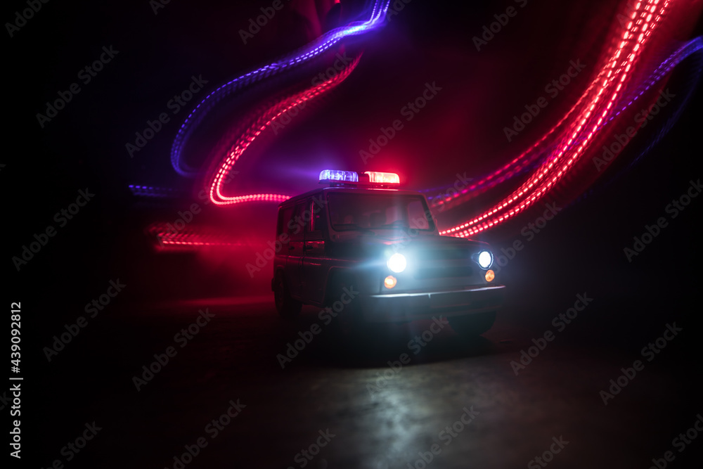 Police car chasing a car at night with fog background. 911 Emergency ...