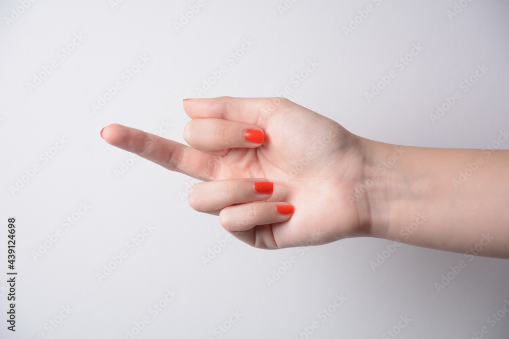 Hand pointing up middle finger, concept of rude hand sign or hand ...