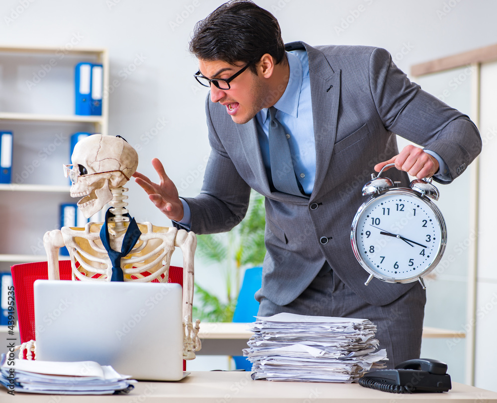 Angry boss yelling at his skeleton employee Stock Photo | Adobe Stock