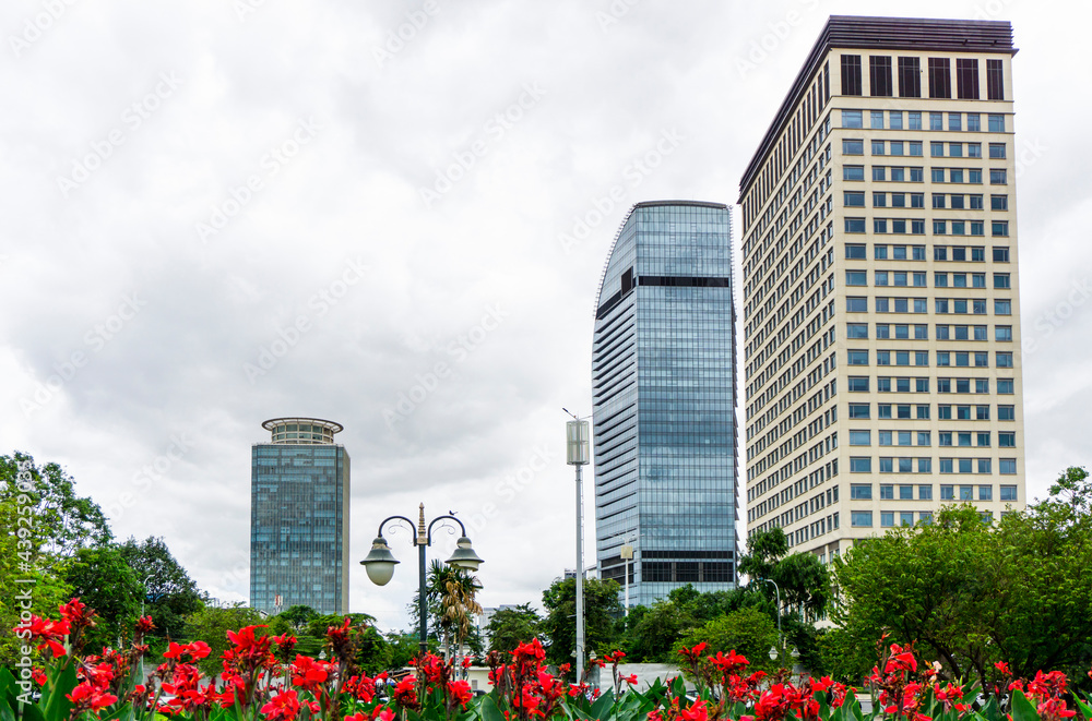 High building of Phnom Penh capital city with beautiful garden. Vatanac ...