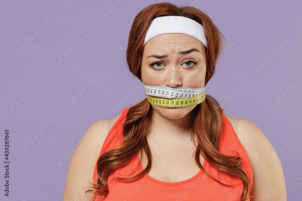 Young sad serious chubby overweight plus size big fat fit woman in red ...