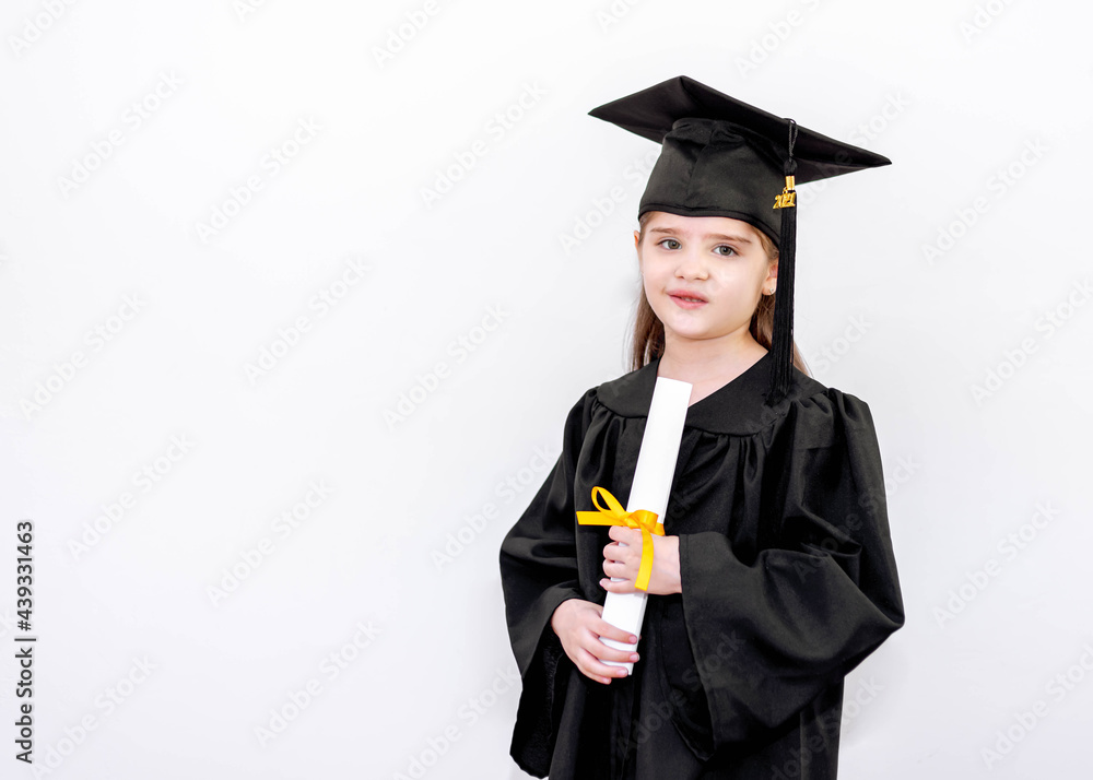 preschool graduation girl with toga and graduation hat white background ...