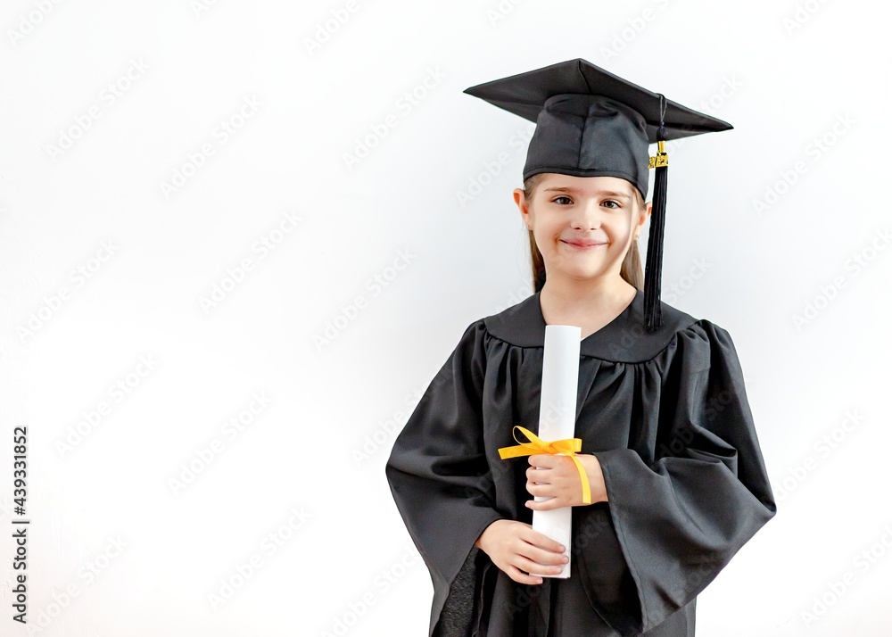 preschool graduation girl with toga and graduation hat white background ...