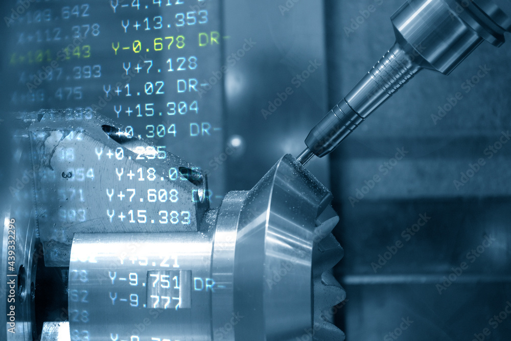 The abstract scene 5-axis machining center cutting the automotive parts ...