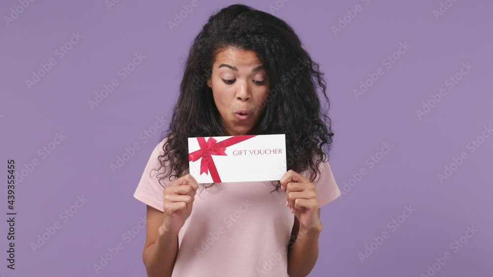 Surprised happy young african woman 20s years old wears pink T-shirt ...