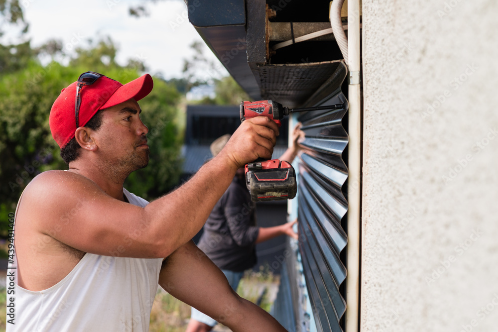 cladding a building Stock Photo | Adobe Stock