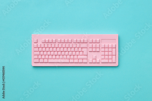 Pink colored papercraft computer keyboard. Stock Photo | Adobe Stock