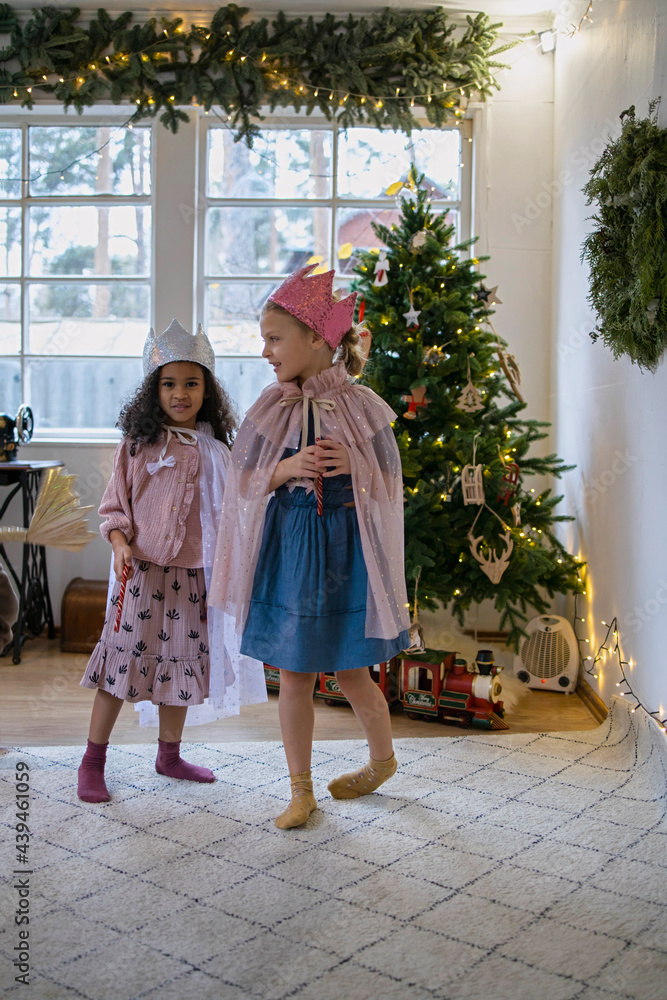Two cute, little girls playing princesses Stock Photo | Adobe Stock