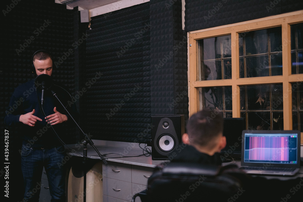 Boys creating songs in recording studio Stock Photo | Adobe Stock