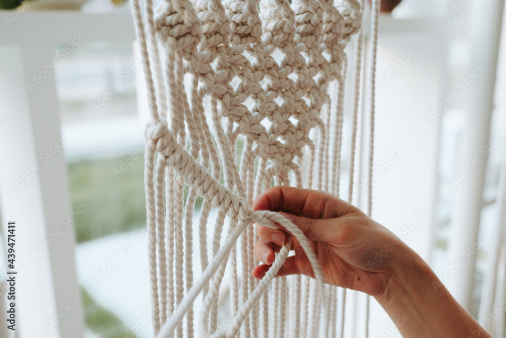 Learning all about macrame Stock Photo | Adobe Stock