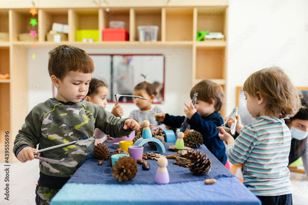 Children playing in kindergarten Stock Photo | Adobe Stock