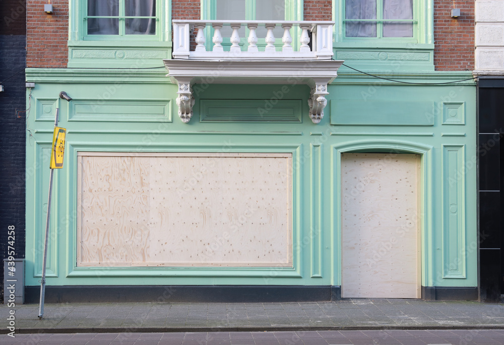 boarded up store window Stock Photo | Adobe Stock