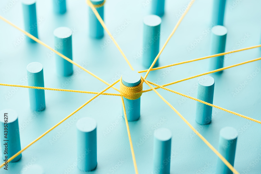 Unconnected pegs around center of network Stock Photo | Adobe Stock