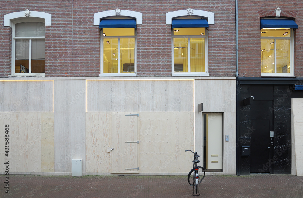 boarded up store window Stock Photo | Adobe Stock