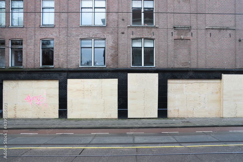 boarded up store window Stock Photo | Adobe Stock