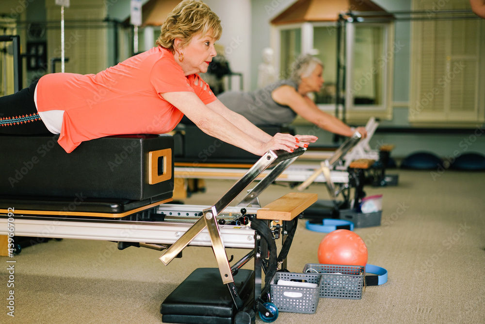 Pilates Class Mature woman Stock Photo | Adobe Stock