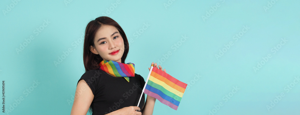 LGBTQ girl and pride flag. Sexy Lesbian girl and LGBTQ flag standing ...